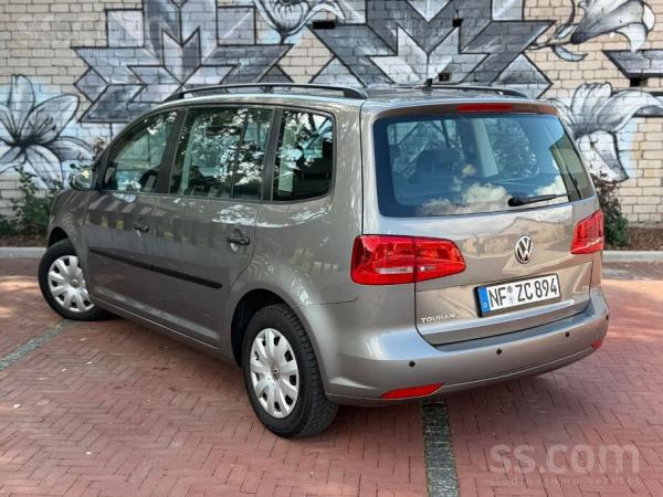 Grey Volkswagen Touran 2011 in Saldus, with an engine capacity of 1.40 L and mileage of 225 thousand km for 5655 €, photo 2 on AUTOMOTO.COM.LV