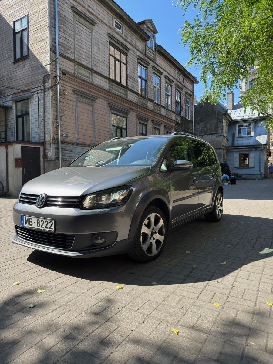 Grey Volkswagen Touran 2012 in Riga, with an engine capacity of 2.00 L and mileage of 230 thousand km for 9700 €, photo 1 on AUTOMOTO.COM.LV