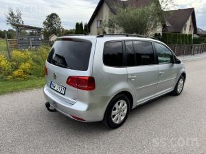 Grey Volkswagen Touran 2012 in Riga, with an engine capacity of 1.60 L and mileage of 218 thousand km for 6100 €, photo 6 on AUTOMOTO.COM.LV