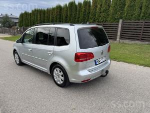 Grey Volkswagen Touran 2012 in Riga, with an engine capacity of 1.60 L and mileage of 218 thousand km for 6100 €, photo 8 on AUTOMOTO.COM.LV