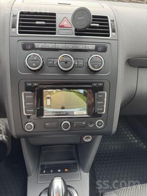 Grey Volkswagen Touran 2012 in Riga, with an engine capacity of 1.60 L and mileage of 218 thousand km for 6100 €, photo 17 on AUTOMOTO.COM.LV