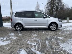 Grey Volkswagen Touran 2013 in Ogre, with an engine capacity of 1.60 L and mileage of 217 thousand km for 7270 €, photo 5 on AUTOMOTO.COM.LV