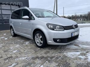Grey Volkswagen Touran 2013 in Ogre, with an engine capacity of 1.60 L and mileage of 217 thousand km for 7270 €, photo 6 on AUTOMOTO.COM.LV