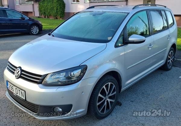 Grey Volkswagen Touran 2014 in Tallinn, with an engine capacity of 1.60 L and mileage of 267 thousand km for 6900 €, photo 1 on AUTOMOTO.COM.LV