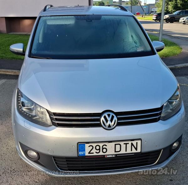 Grey Volkswagen Touran 2014 in Tallinn, with an engine capacity of 1.60 L and mileage of 267 thousand km for 6900 €, photo 6 on AUTOMOTO.COM.LV