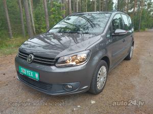 Pelēks Volkswagen Touran 2015 Tallina, ar dzinēja tilpumu 1.60 L un nobraukumu 147 tūkst. km par 9900 €, foto  vietnē AUTOMOTO.COM.LV