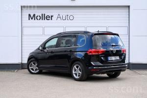 Grey Volkswagen Touran 2016 in Riga, with an engine capacity of 2.00 L and mileage of 203 thousand km for 13950 €, photo 4 on AUTOMOTO.COM.LV