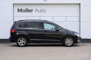 Grey Volkswagen Touran 2016 in Riga, with an engine capacity of 2.00 L and mileage of 203 thousand km for 13950 €, photo 6 on AUTOMOTO.COM.LV