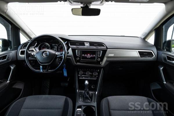 Grey Volkswagen Touran 2016 in Riga, with an engine capacity of 2.00 L and mileage of 203 thousand km for 13950 €, photo 8 on AUTOMOTO.COM.LV
