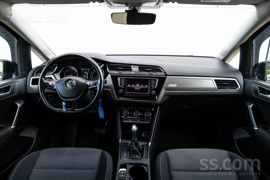 Grey Volkswagen Touran 2016 in Riga, with an engine capacity of 2.00 L and mileage of 203 thousand km for 13950 €, photo 9 on AUTOMOTO.COM.LV