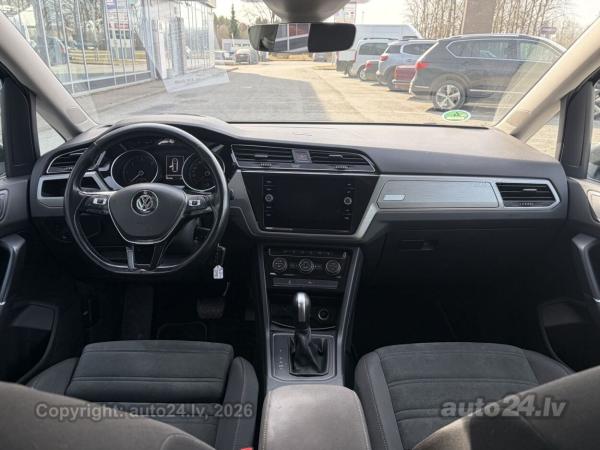 Grey Volkswagen Touran 2019 in Viljandi, with an engine capacity of 2.00 L and mileage of 207 thousand km for 16390 €, photo 5 on AUTOMOTO.COM.LV
