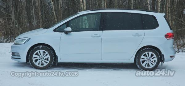 Grey Volkswagen Touran 2021 in Tallinn, with an engine capacity of 1.50 L and mileage of 60 thousand km for 25000 €, photo 6 on AUTOMOTO.COM.LV