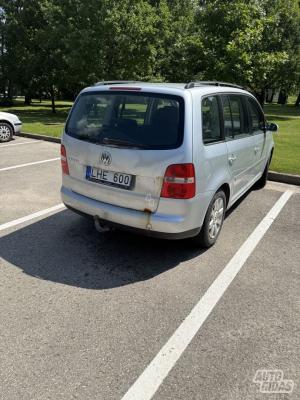 Volkswagen Touran 2005 in Ignalina, with an engine capacity of 2.00 L and mileage of 256 thousand km for 1350 €, photo 5 on AUTOMOTO.COM.LV
