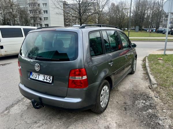 Volkswagen Touran 2006 in Kaunas, with an engine capacity of 1.90 L and mileage of 330 thousand km for 1750 €, photo 5 on AUTOMOTO.COM.LV