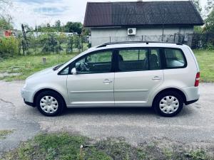 Volkswagen Touran 2004 in Daugavpils, with an engine capacity of 1.90 L and mileage of 259 thousand km for 2599 €, photo 8 on AUTOMOTO.COM.LV