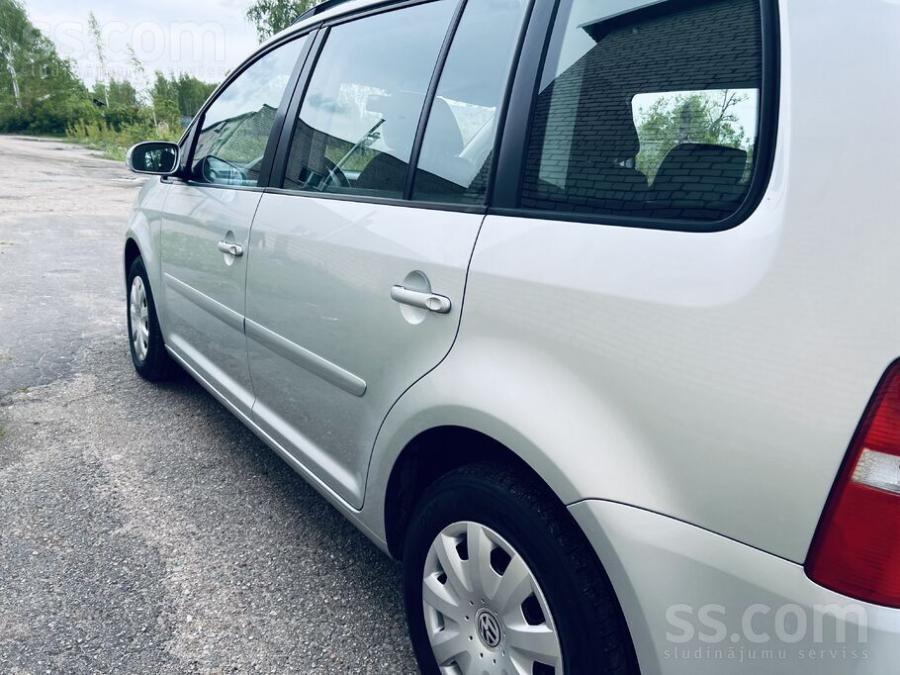 Volkswagen Touran 2004 in Daugavpils, with an engine capacity of 1.90 L and mileage of 259 thousand km for 2599 €, photo 12 on AUTOMOTO.COM.LV