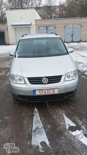 Volkswagen Touran 2004 in Vilnius, with an engine capacity of 20.00 L and mileage of 246 thousand km for 2300 €, photo  on AUTOMOTO.COM.LV