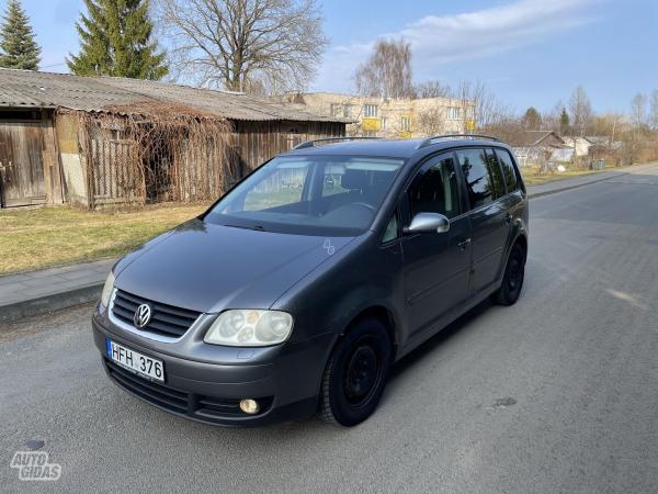 Volkswagen Touran 2004 in Panevezys, with an engine capacity of 2.00 L and mileage of 335 thousand km for 799 €, photo 1 on AUTOMOTO.COM.LV