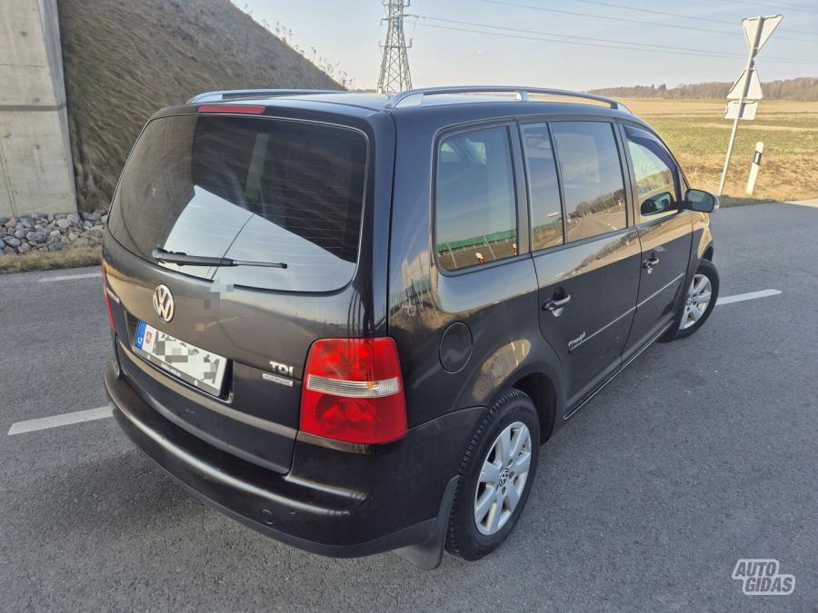 Volkswagen Touran 2005 in Kaunas, with an engine capacity of 2.00 L and mileage of 400 thousand km for 1950 €, photo 4 on AUTOMOTO.COM.LV