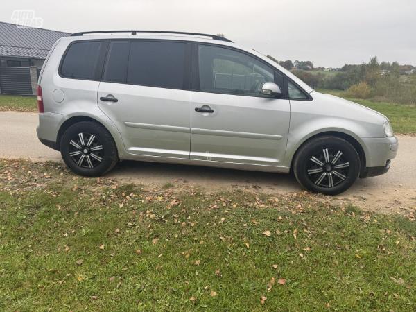 Volkswagen Touran 2005 in Vilnius, with an engine capacity of 1.90 L and mileage of 259 thousand km for 1499 €, photo 6 on AUTOMOTO.COM.LV