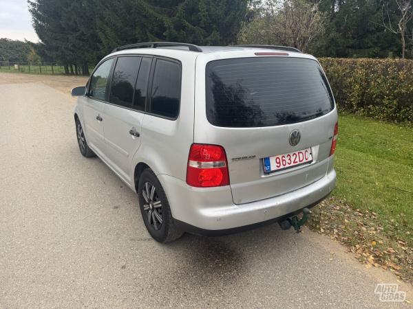 Volkswagen Touran 2005 in Vilnius, with an engine capacity of 1.90 L and mileage of 259 thousand km for 1499 €, photo 8 on AUTOMOTO.COM.LV