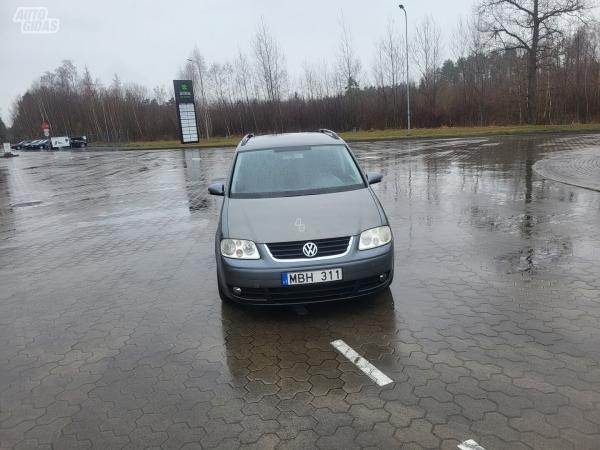 Volkswagen Touran 2006 in Kaunas, with an engine capacity of 2.00 L and mileage of 345 thousand km for 990 €, photo 1 on AUTOMOTO.COM.LV
