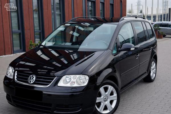 Volkswagen Touran 2006 in Kaunas, with an engine capacity of 2.00 L and mileage of 290 thousand km for 1699 €, photo 1 on AUTOMOTO.COM.LV