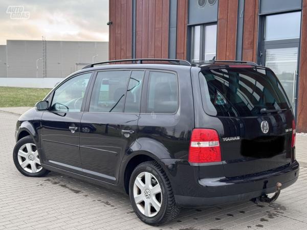 Volkswagen Touran 2006 in Kaunas, with an engine capacity of 2.00 L and mileage of 290 thousand km for 1699 €, photo 3 on AUTOMOTO.COM.LV