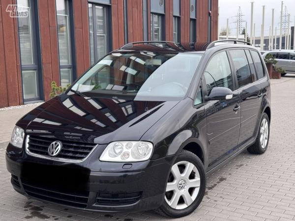 Volkswagen Touran 2006 in Kaunas, with an engine capacity of 2.00 L and mileage of 290 thousand km for 1699 €, photo 4 on AUTOMOTO.COM.LV