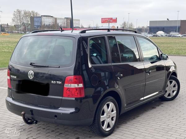 Volkswagen Touran 2006 in Kaunas, with an engine capacity of 2.00 L and mileage of 290 thousand km for 1699 €, photo 5 on AUTOMOTO.COM.LV