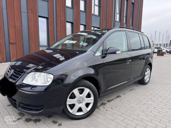 Volkswagen Touran 2006 in Kaunas, with an engine capacity of 2.00 L and mileage of 290 thousand km for 1699 €, photo 6 on AUTOMOTO.COM.LV