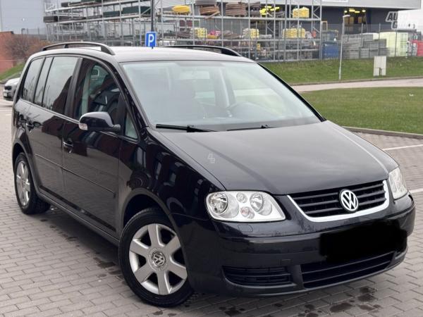 Volkswagen Touran 2006 in Kaunas, with an engine capacity of 2.00 L and mileage of 290 thousand km for 1699 €, photo 7 on AUTOMOTO.COM.LV