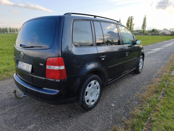Volkswagen Touran 2006 Jurbarkas, ar dzinēja tilpumu 1.90 L un nobraukumu 369 tūkst. km par 1350 €, foto 6 vietnē AUTOMOTO.COM.LV