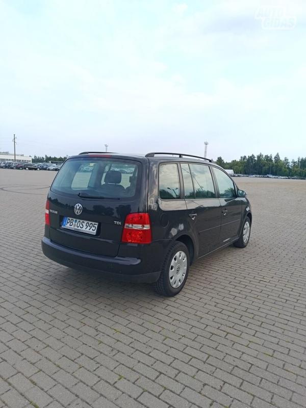 Volkswagen Touran 2006 in Marijampole on AUTOMOTO.COM.LV Volkswagen Touran 2006 in Marijampole, with an engine capacity of 1.90 L and mileage of 294 thousand km for 1999 €, photo 5 on AUTOMOTO.COM.LV
