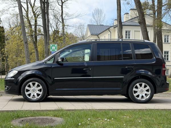 Volkswagen Touran 2008 in Kaunas, with an engine capacity of 2.00 L and mileage of 260 thousand km for 2699 €, photo 7 on AUTOMOTO.COM.LV