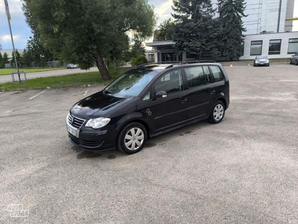 Volkswagen Touran 2008 in Kaunas, with an engine capacity of 1.90 L and mileage of 310 thousand km for 1790 €, photo 3 on AUTOMOTO.COM.LV