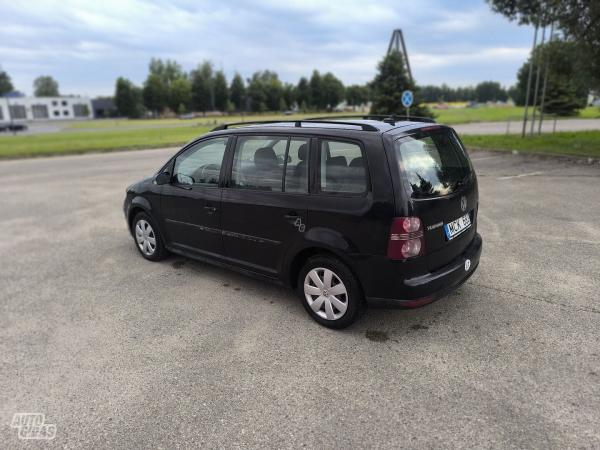 Volkswagen Touran 2008 in Kaunas, with an engine capacity of 1.90 L and mileage of 310 thousand km for 1790 €, photo 4 on AUTOMOTO.COM.LV