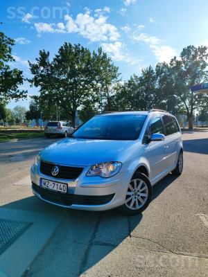 Volkswagen Touran 2009 Rīga, ar dzinēja tilpumu 1.90 L un nobraukumu 350 tūkst. km par 2595 €, foto 2 vietnē AUTOMOTO.COM.LV