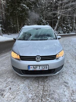 Volkswagen Touran 2011 in Kaunas, with an engine capacity of 1.40 L and mileage of 252 thousand km for 3999 €, photo 2 on AUTOMOTO.COM.LV