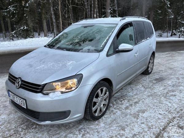 Volkswagen Touran 2011 in Kaunas, with an engine capacity of 1.40 L and mileage of 252 thousand km for 3999 €, photo 3 on AUTOMOTO.COM.LV
