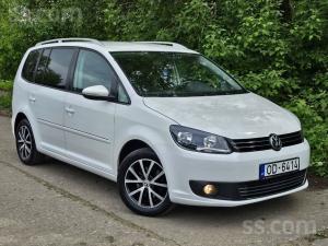 Volkswagen Touran 2012 in Riga, with an engine capacity of 1.60 L and mileage of 237 thousand km for 6890 €, photo 2 on AUTOMOTO.COM.LV