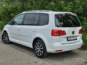 Volkswagen Touran 2012 in Riga, with an engine capacity of 1.60 L and mileage of 237 thousand km for 6890 €, photo 5 on AUTOMOTO.COM.LV