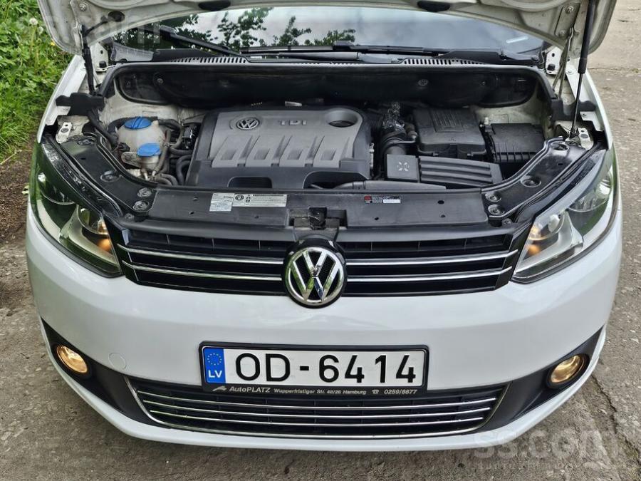 Volkswagen Touran 2012 in Riga, with an engine capacity of 1.60 L and mileage of 237 thousand km for 6890 €, photo 34 on AUTOMOTO.COM.LV