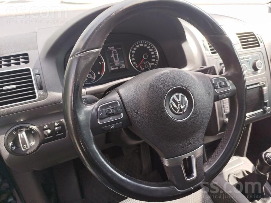 Volkswagen Touran 2014 in Riga, with an engine capacity of 1.60 L and mileage of 191 thousand km for 6500 €, photo 8 on AUTOMOTO.COM.LV