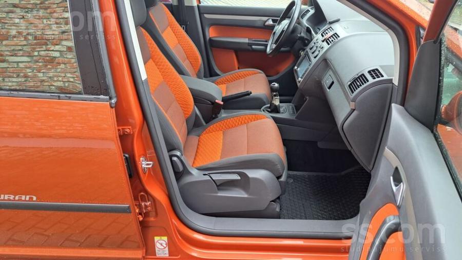 Orange Volkswagen Touran 2007 in Talsi, with an engine capacity of 2.00 L and mileage of 0 thousand km for 5440 €, photo 41 on AUTOMOTO.COM.LV