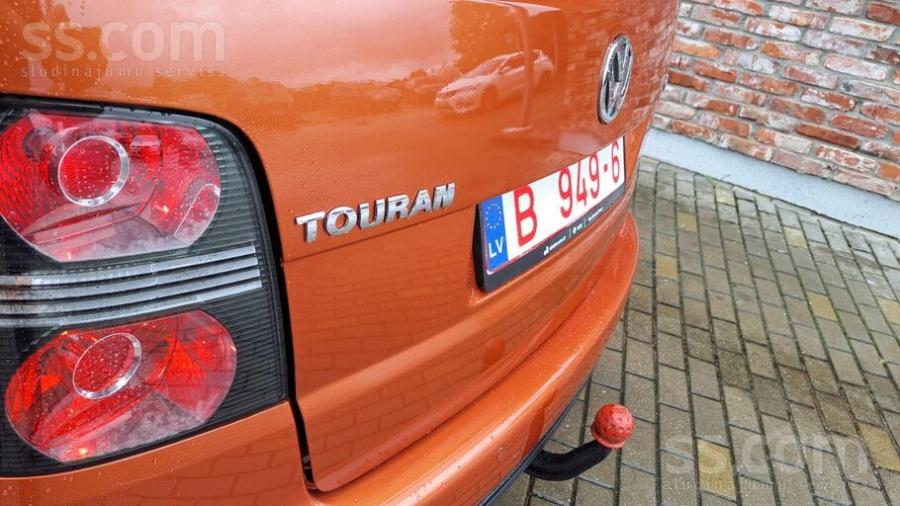 Orange Volkswagen Touran 2007 in Talsi, with an engine capacity of 2.00 L and mileage of 0 thousand km for 5440 €, photo 23 on AUTOMOTO.COM.LV
