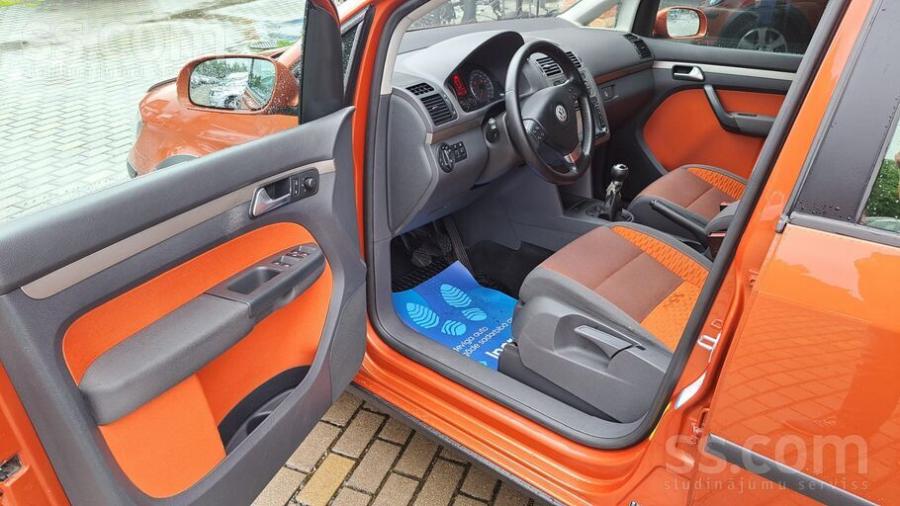 Orange Volkswagen Touran 2007 in Talsi, with an engine capacity of 2.00 L and mileage of 0 thousand km for 5440 €, photo 47 on AUTOMOTO.COM.LV