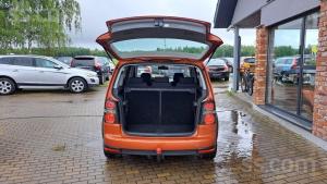 Orange Volkswagen Touran 2007 in Talsi, with an engine capacity of 2.00 L and mileage of 0 thousand km for 5440 €, photo 21 on AUTOMOTO.COM.LV