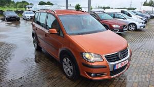 Orange Volkswagen Touran 2007 in Talsi, with an engine capacity of 2.00 L and mileage of 0 thousand km for 5440 €, photo 30 on AUTOMOTO.COM.LV