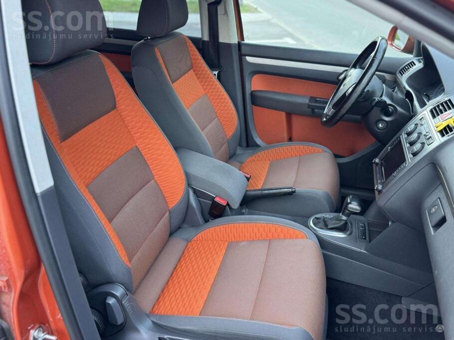 Orange Volkswagen Touran 2007 in Riga, with an engine capacity of 1.40 L and mileage of 146 thousand km for 4295 €, photo 5 on AUTOMOTO.COM.LV